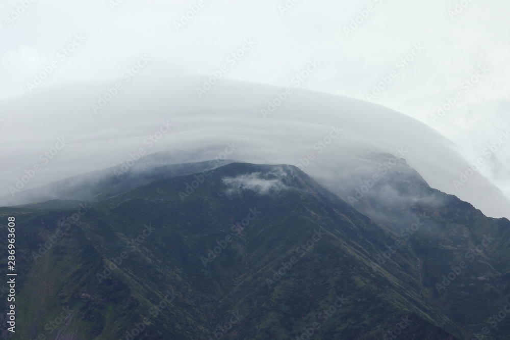 Atsonupuri Volcano on the coast of Iturup island, the Sea of Okhotsk ...