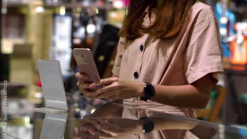 Young woman paying by scanning QR Code with smartphone Stock Video ...