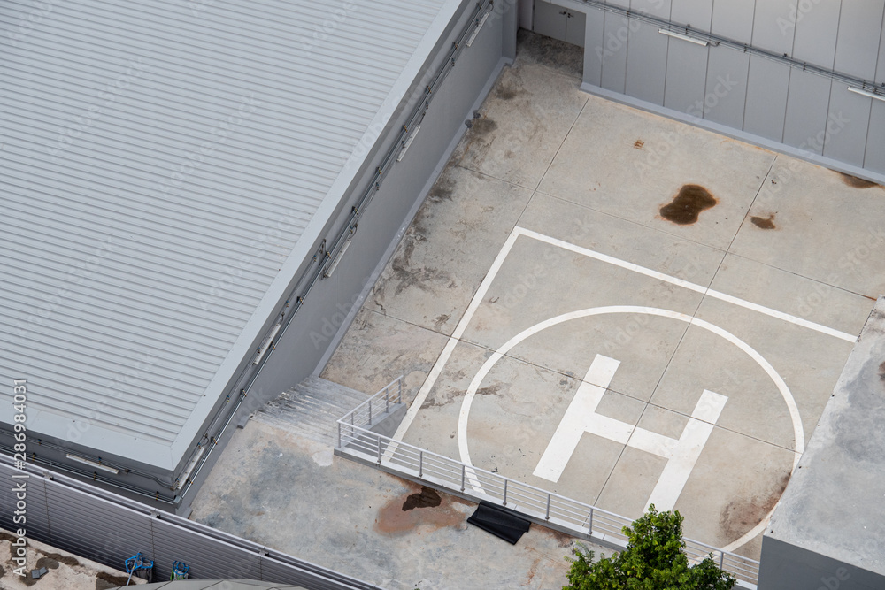 Top view of helicopter on building from sky. background concept for ...