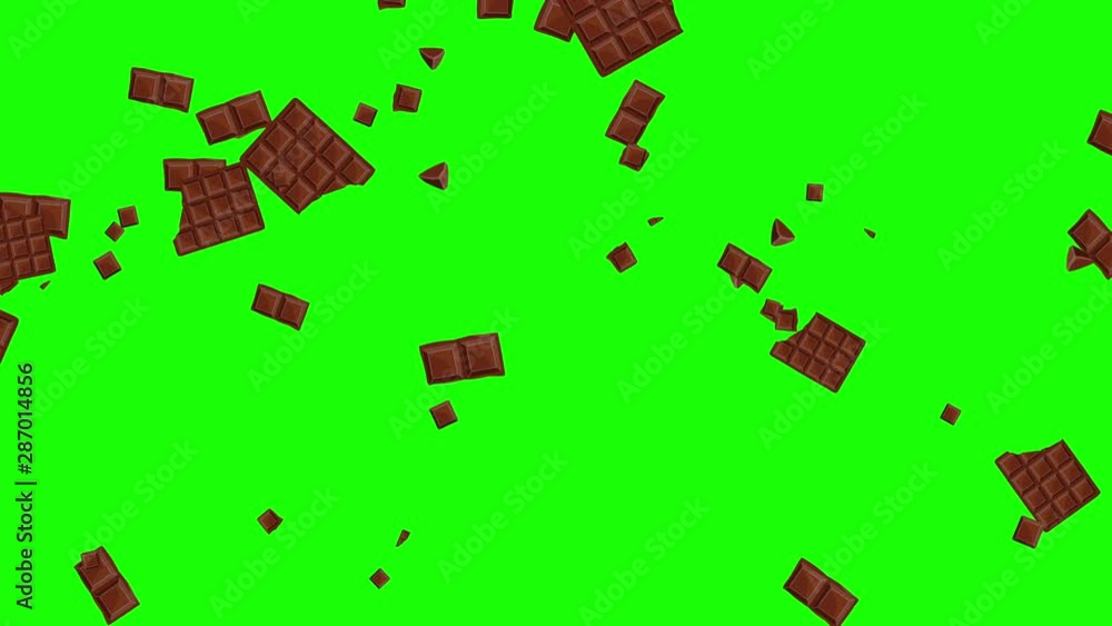 Pieces of a chocolate bar of different sizes falling and floating on ...