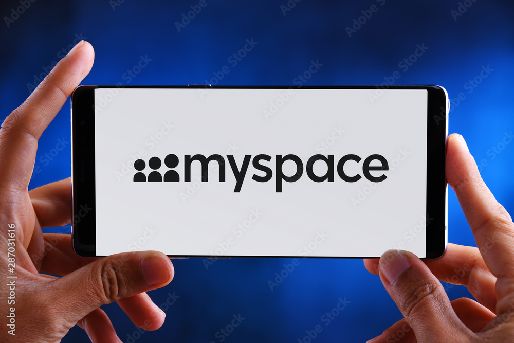 Hands holding smartphone displaying logo of Myspace Stock Photo | Adobe ...