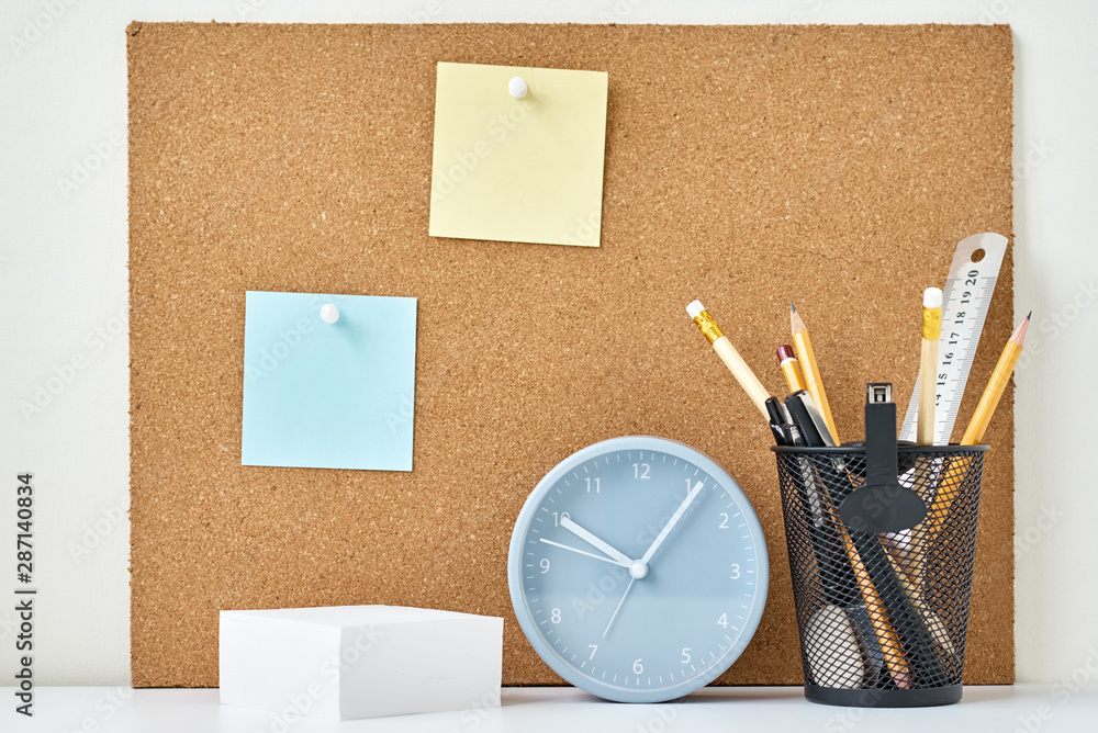 Concept of notes, goals, memo or action plan. Sticky notes on a cork ...