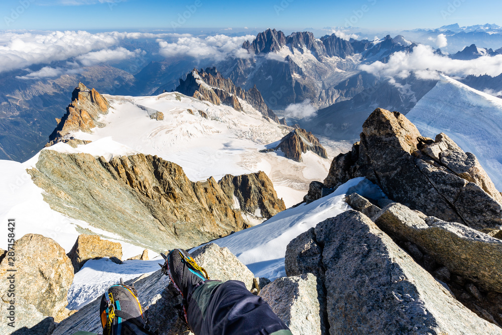 Alpinist mountaineer feet mountain summit landscape Mont Blanc. Stock ...