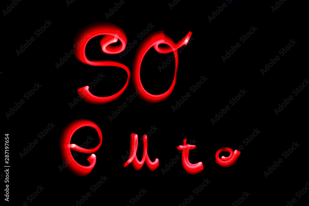 Sentence " so cute " written with a led lamp during a lightpainting ...