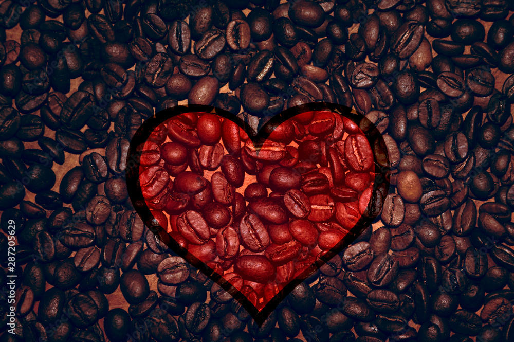 Spilled coffee beans. Top view . Warm colors. In the middle a heart ...
