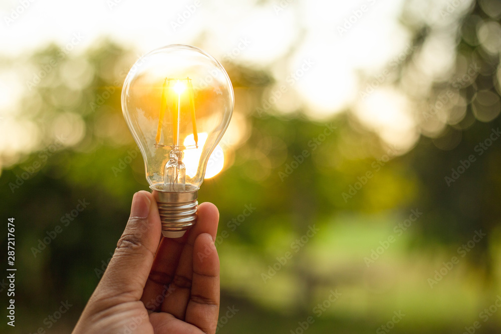 Save energy to reduce global warming.Creative ideas concept, light bulb ...