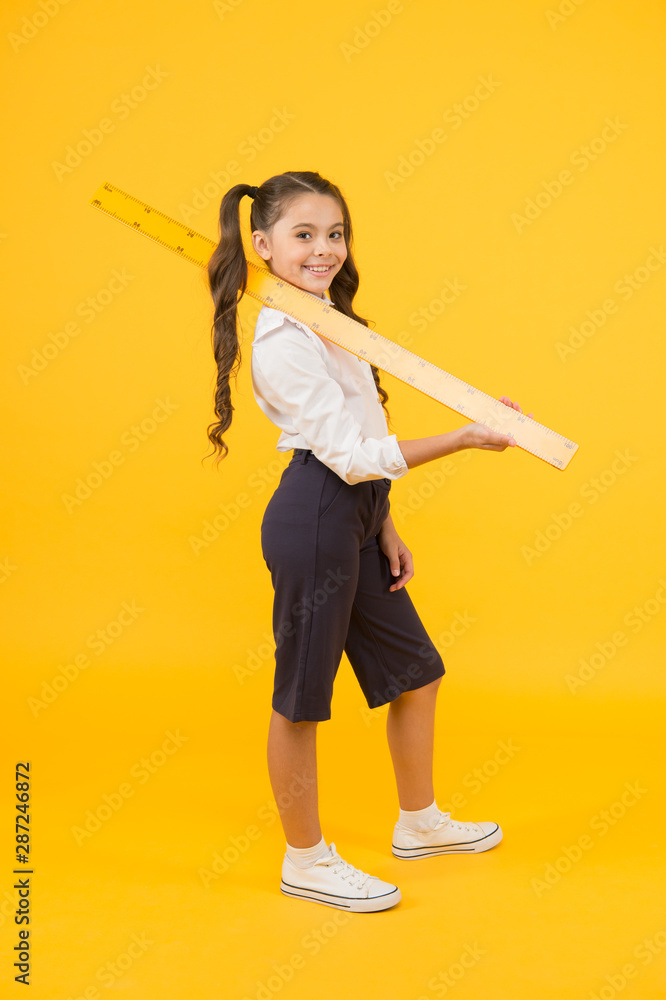 Ruler makes the drawing look better. Small child holding drawing ...