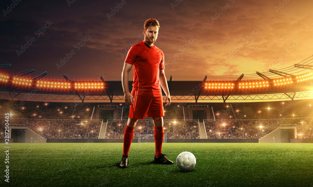 Soccer player in sport uniform ready for the game. Stadium with green ...