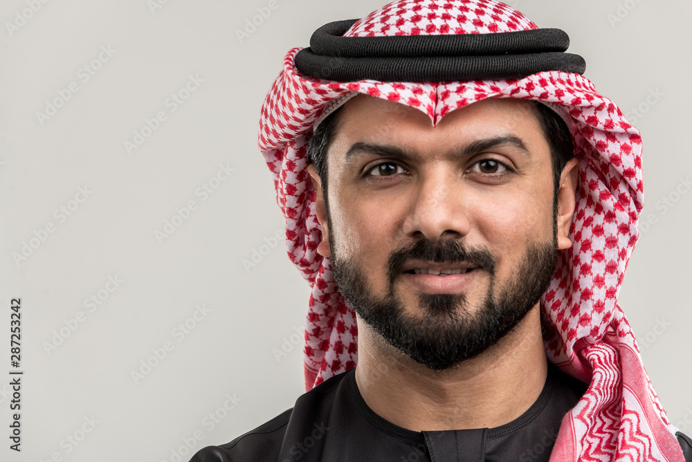 Arabian man with traditional dress Stock Photo | Adobe Stock