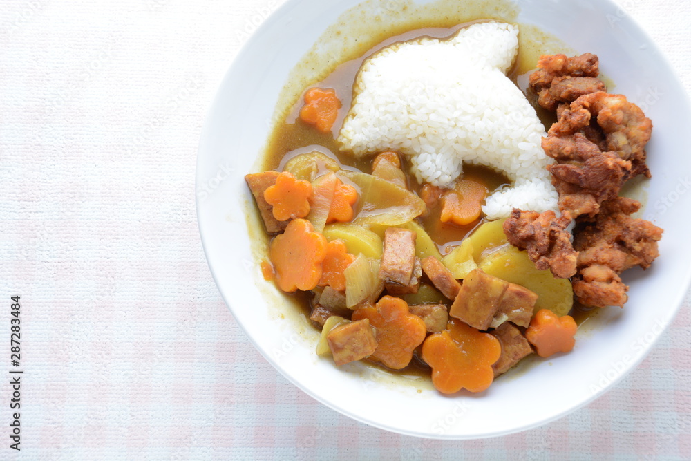 Japanese curry with dolphin rice shape and fried chicken. (Karaage ...