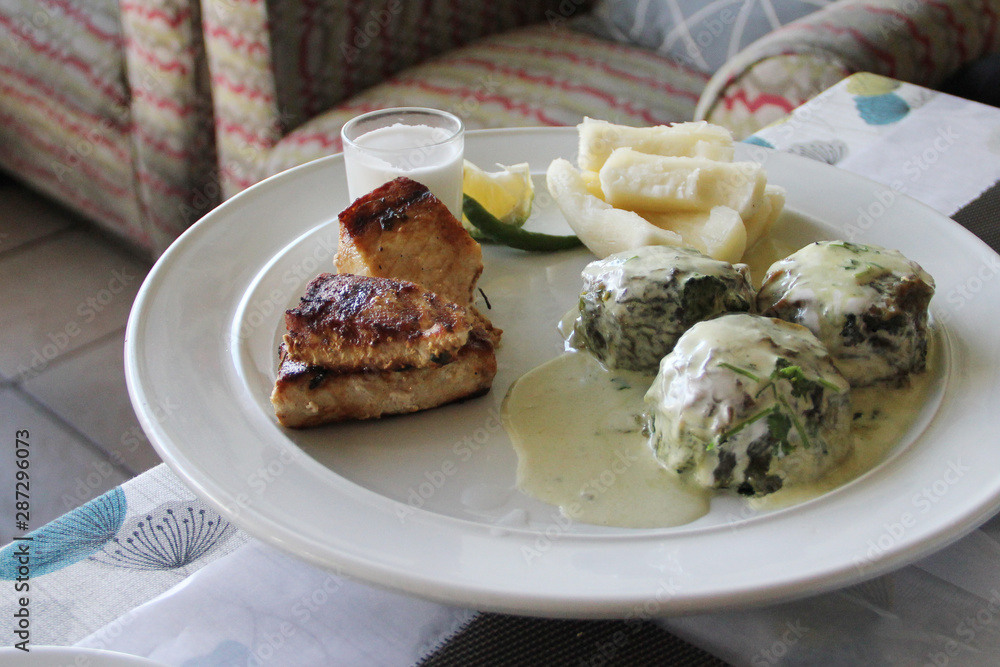 Traditional Fijian food: Rourou (taro leaves soaked in coconut milk ...
