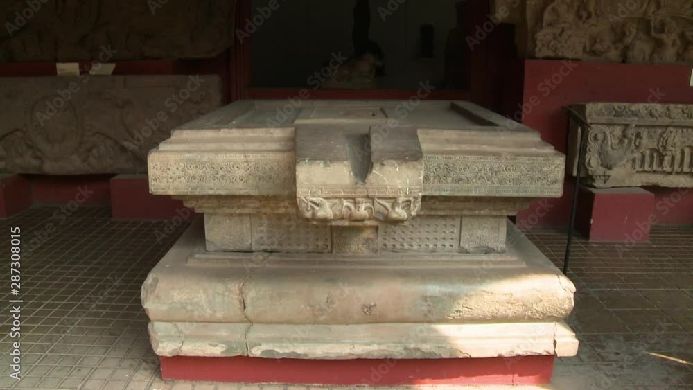A steady closeup shot of one of the shakti yoni stone altar, a symbol ...