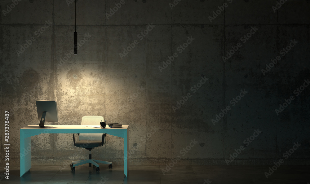 A workplace with one office desk and an armchair in an empty gloomy ...