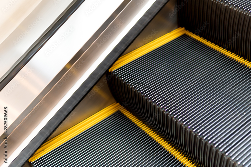Escalator in underground. Moving up staircase. escalator. electric ...