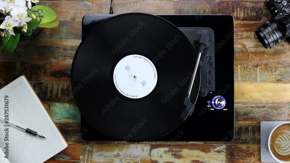 Vinyl Record Player Turntable on a Stylish Wood Table with Notepad ...
