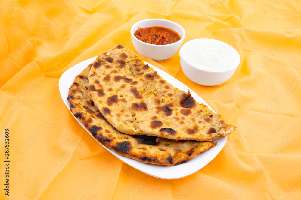 Indian Traditional Breakfast Dish Aloo Paratha is a Potato Stuffed ...