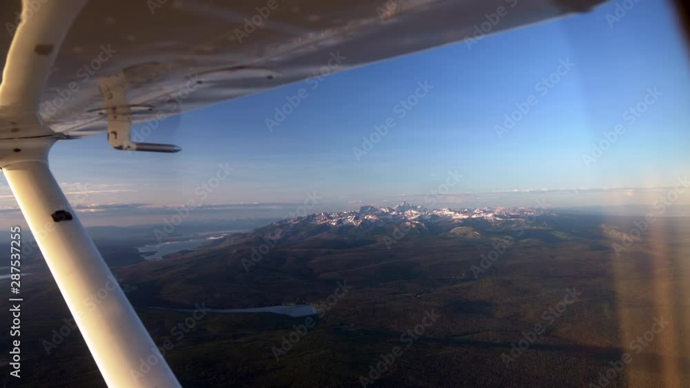 AERIAL Inside A Light Aircraft of Mountain Ranges of Grand Teton ...