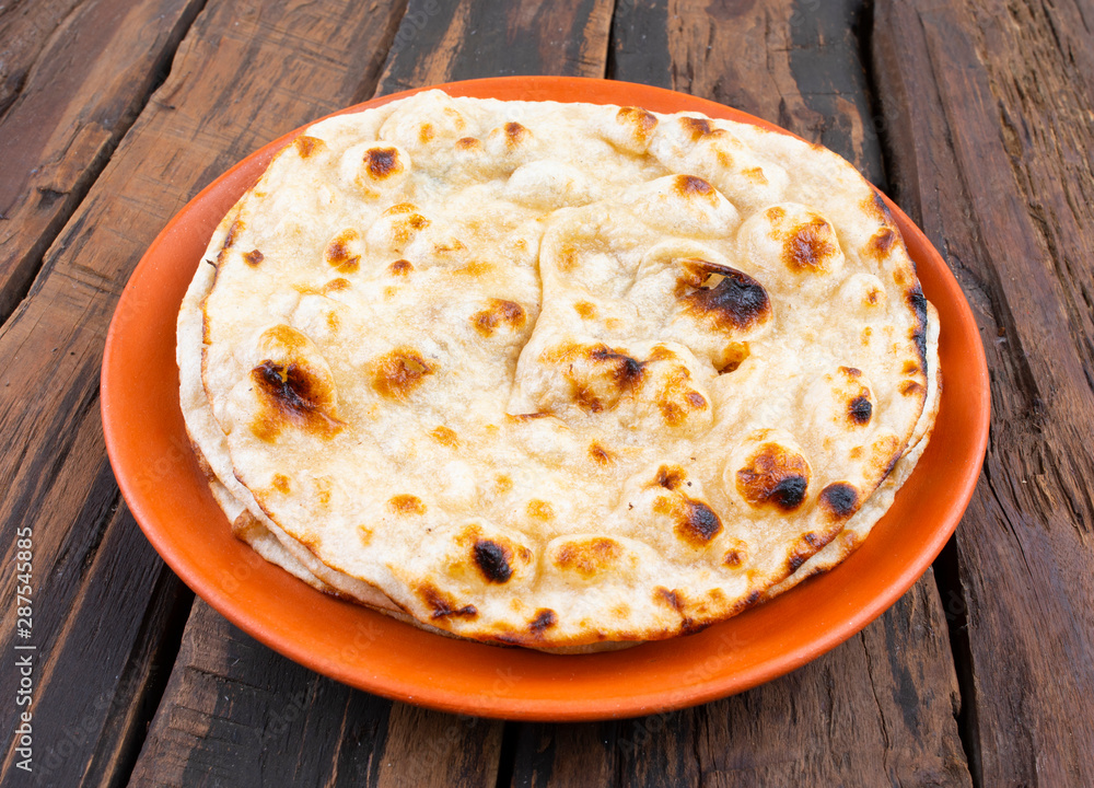 Indian Cuisine - Tandoori Roti whole wheat flat bread made from ...