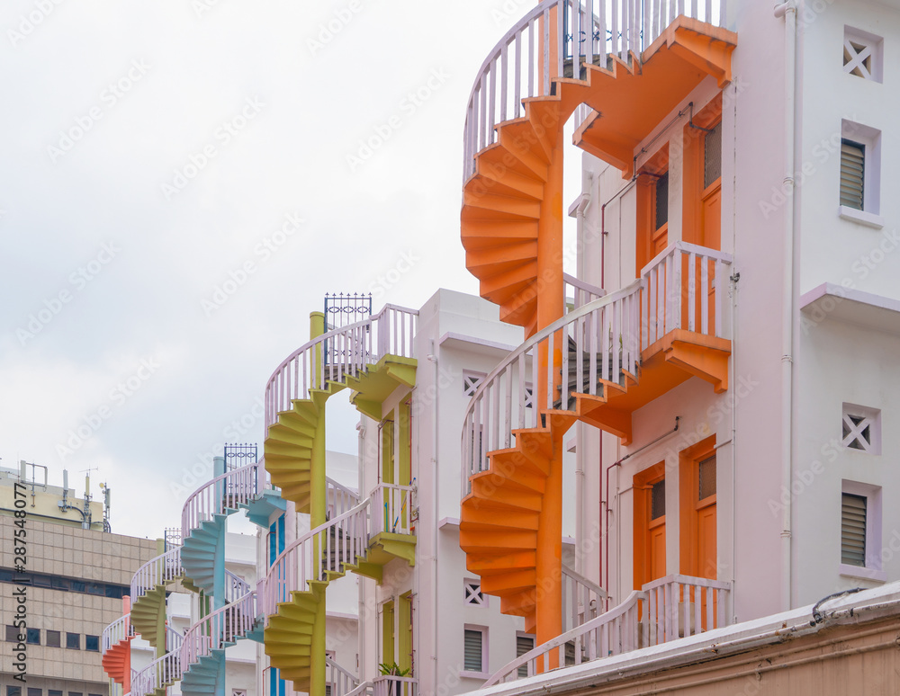 Close up of colorful pastel spiral staircases in Singapore, Bugis ...