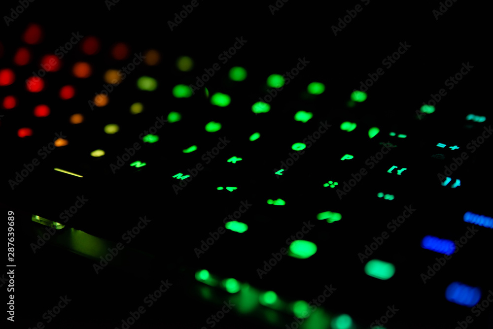 Diagonal RGB gaming keyboard bokeh background. Colorful mechanical ...