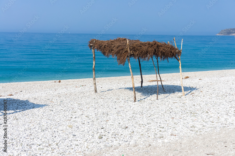 Straw canopy on the beach. Borsh Albania Stock Photo | Adobe Stock