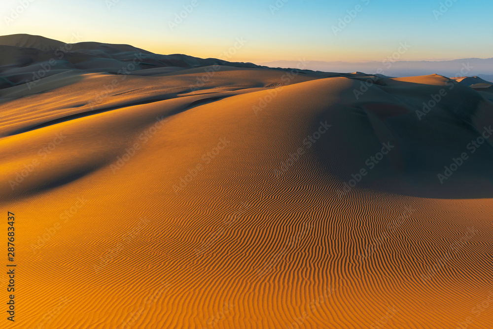 Sunset landscape in the majestic coastal peruvian desert located ...