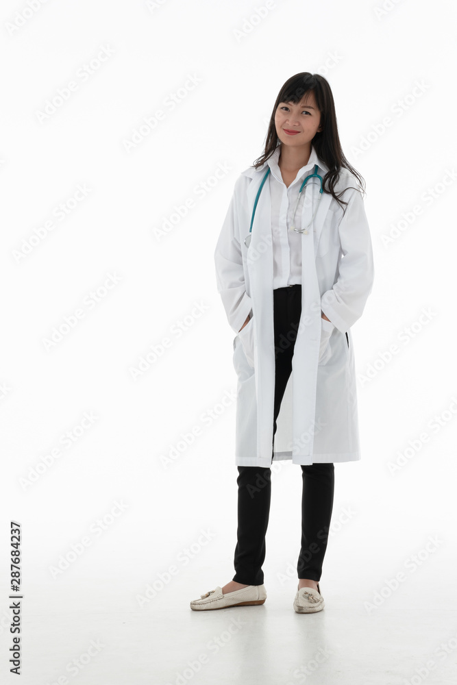 Full body portrait of smiling young female doctor isolated over white ...