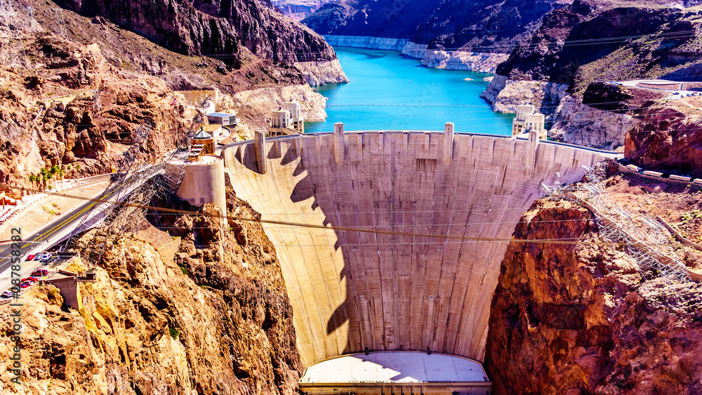 Frontal view of the Hoover Dam, a concrete arch dam in the Black Canyon ...