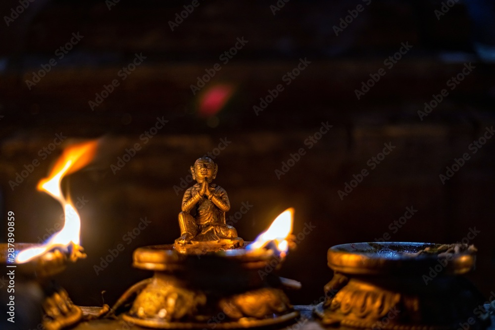 Religious statue with both hands together in Namaste position placed ...
