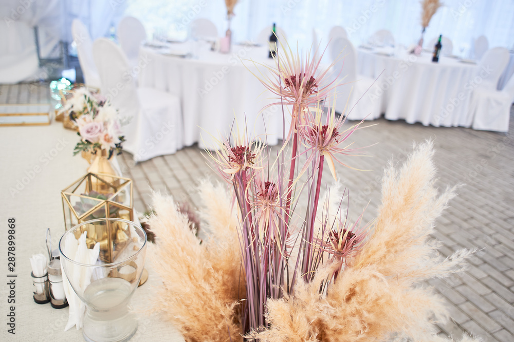 Wedding decoration in boho style. Light colors, in the tent.Wedding ...