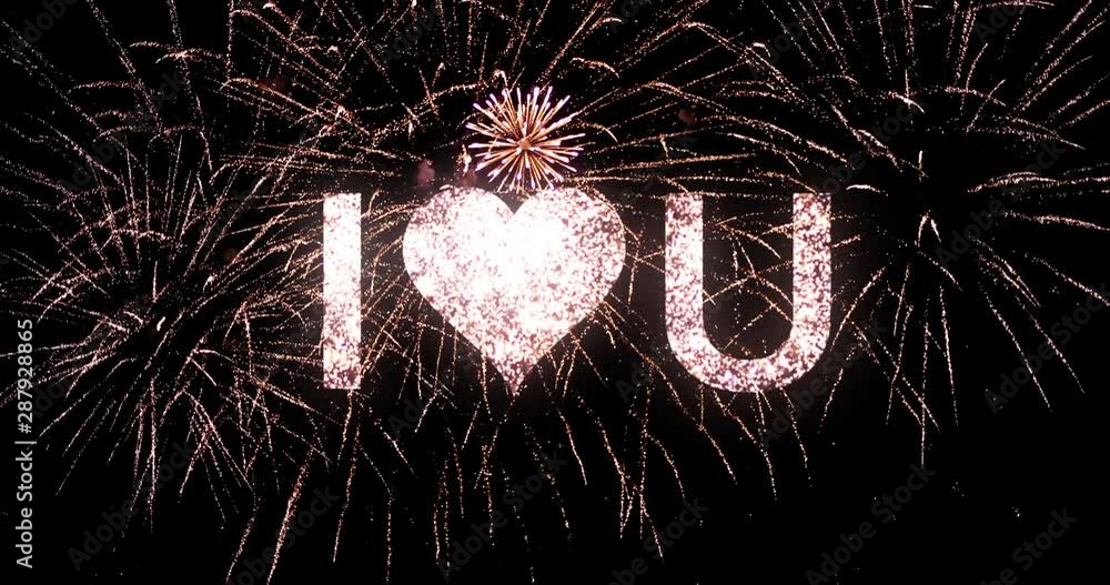 I love you message in the sky with fireworks and sparks on black night ...