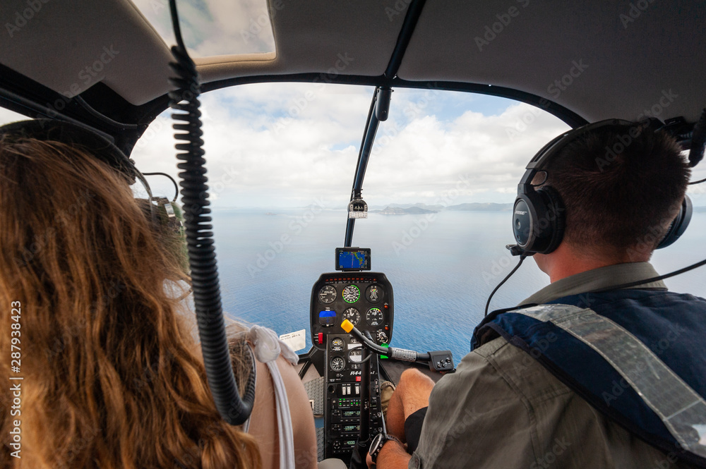 View out the cockpit of a helicopter over the Whitsunday Islands on a ...
