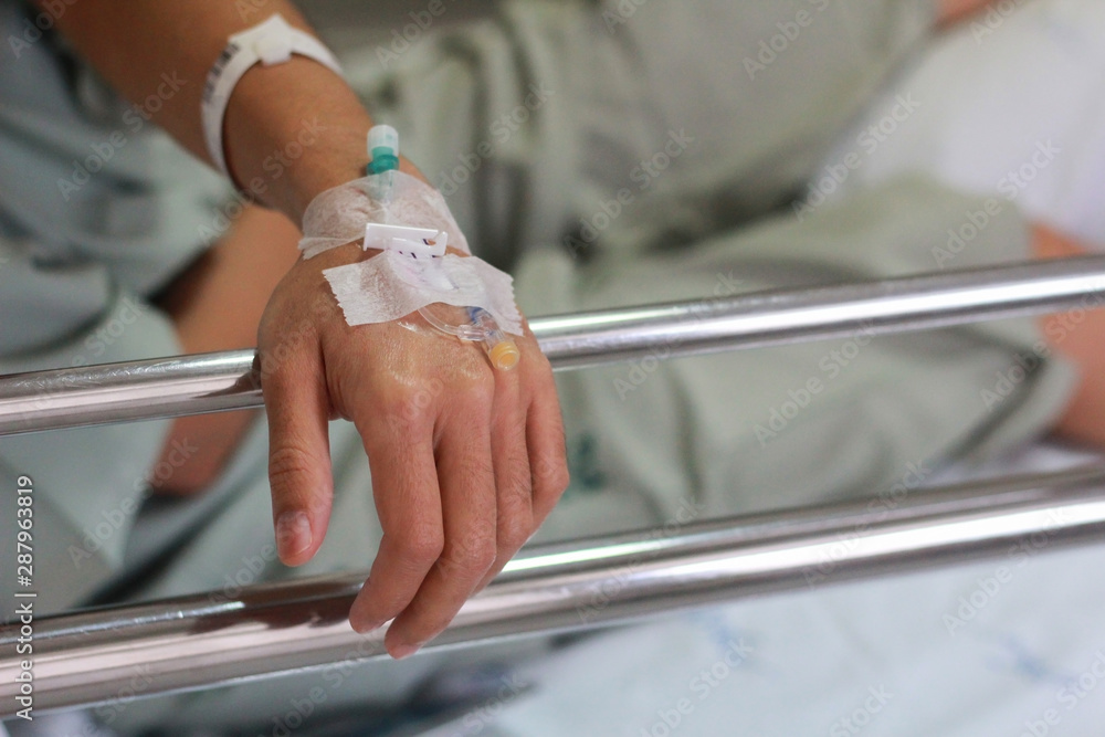 the intravenous fluid on a woman patient hand in the hospital. Stock ...