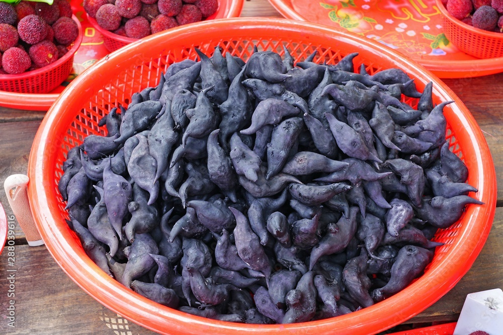 View of black water caltrop water chestnuts shaped like bats (buffalo ...