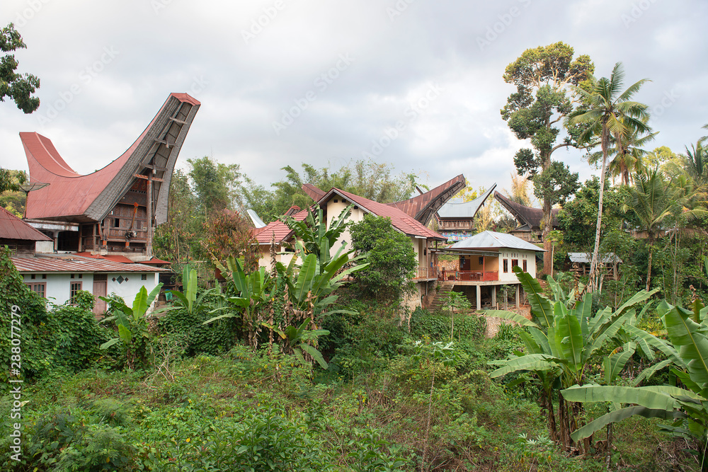 Traditional Alang rice barn and the Tongkonan building , is the ...