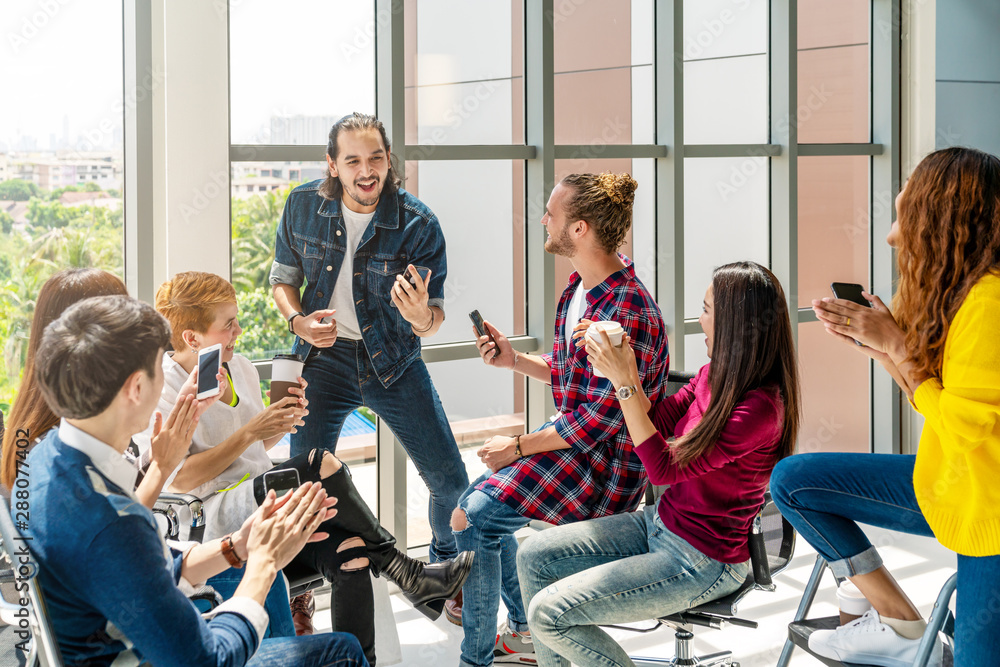 Foto de Group of happy asian employee celebrate, excited and fun with ...