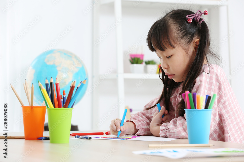 Asian preschool student do homework by drawing by a color, this image ...