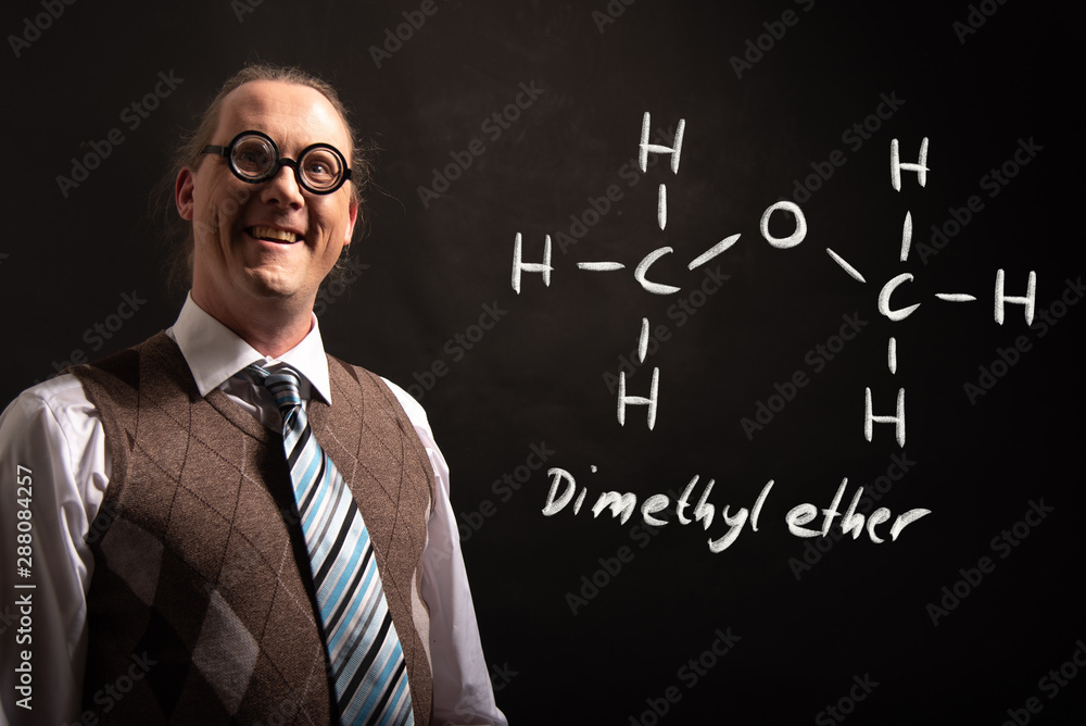 Professor presenting handdrawn chemical formula of Dimethyl ether ...