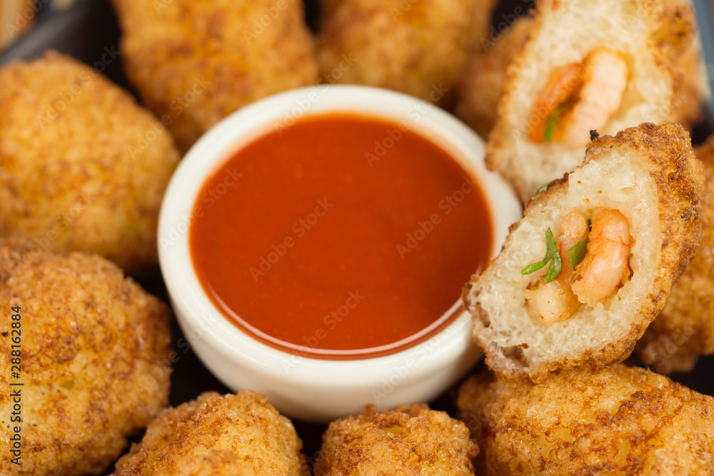 Tapioca fried balls stuffed with shrimp and pepper sauce Stock Photo ...