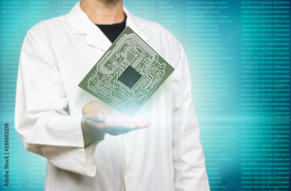 Young white scientist holding computer microchip on a modern blue ...