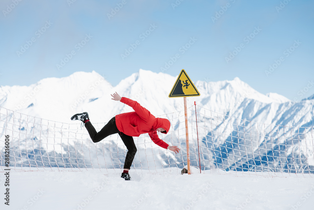 Man showing funny pose from warning sign Stock Photo | Adobe Stock