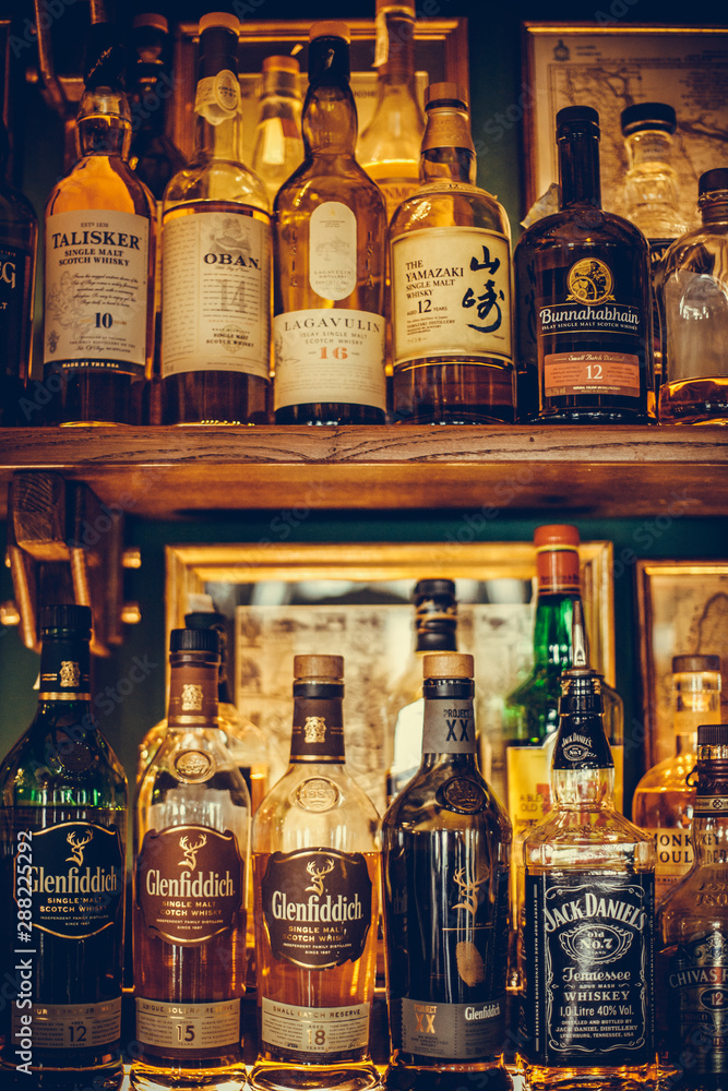 Alcohol bottle in a bar Stock Photo | Adobe Stock