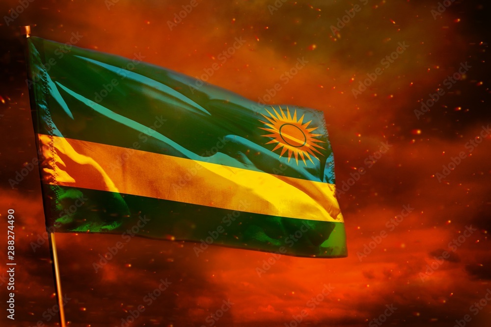 Fluttering Rwanda flag on crimson red sky with smoke pillars background ...