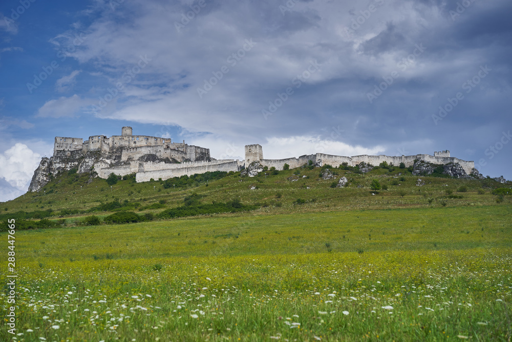 The ruins of Spis Castle in eastern Slovakia taken in summer day, in ...