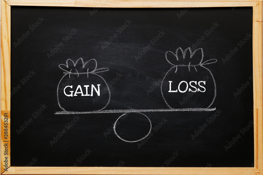 Write symbol Gain and loss bags on a basic balance scale on blackboard ...