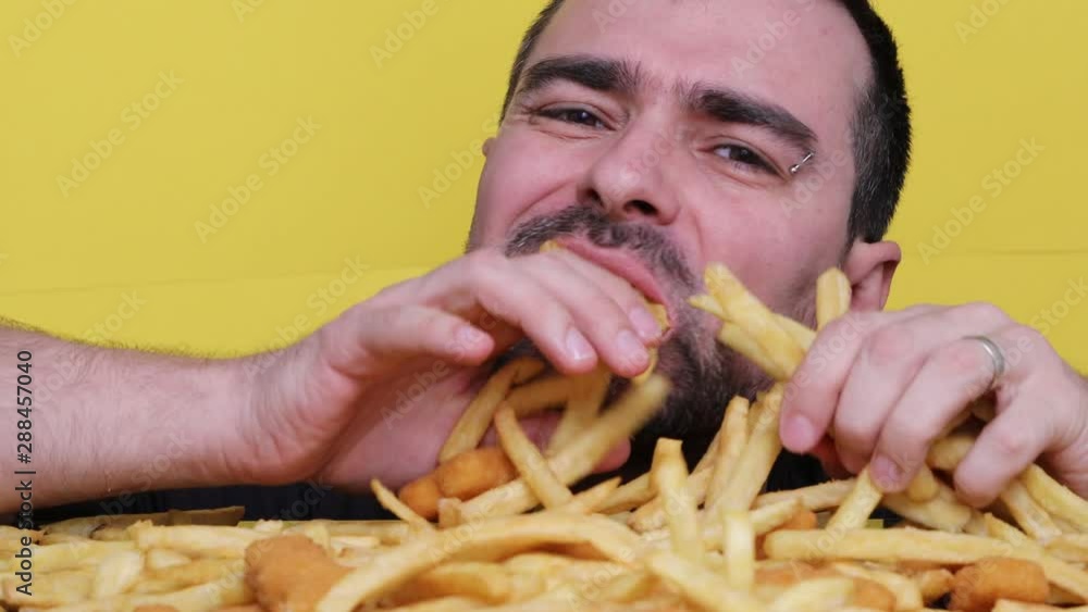 Eating junk food nutrition and dietary health problem concept. Young ...