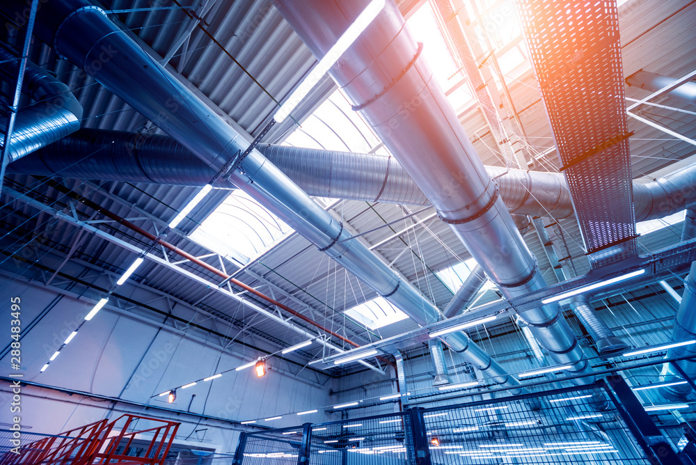 Air conditioning of buildings. Background of ventilation pipes. Laying ...