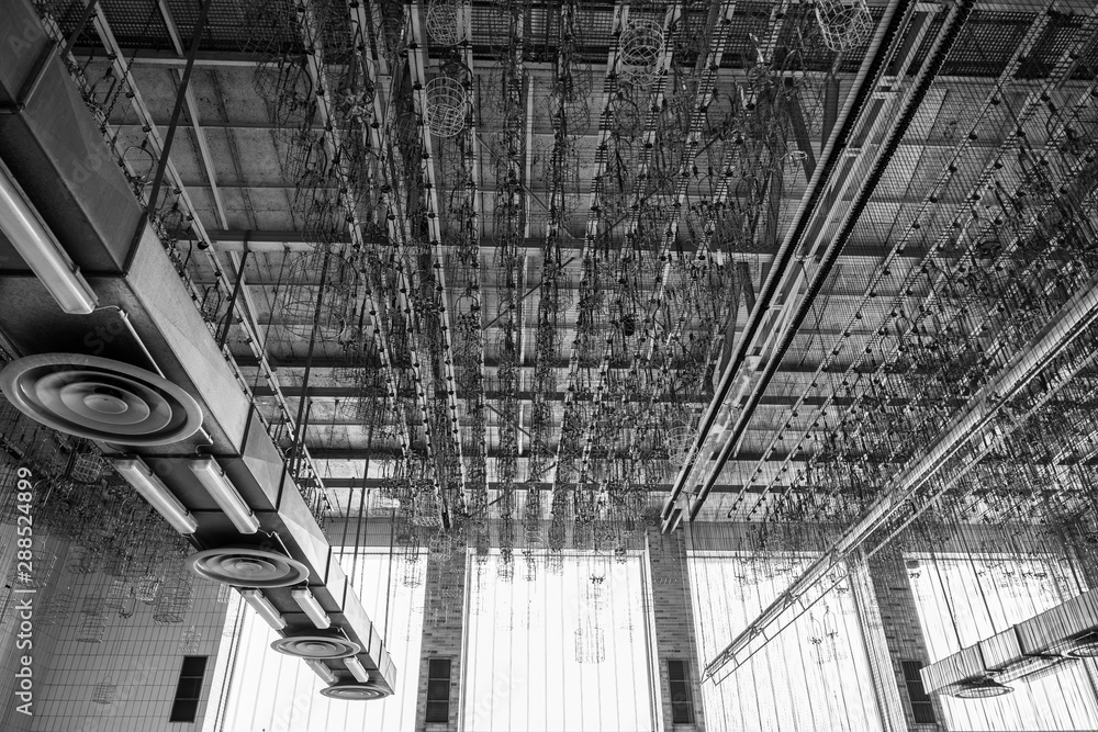 Black and white tone, low angle interior view of open ceiling of old ...