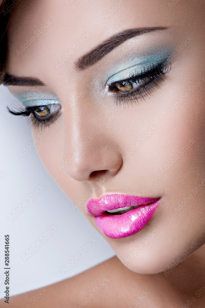 Face of young girl with vivid blue color eye makeup of eyelid Stock ...