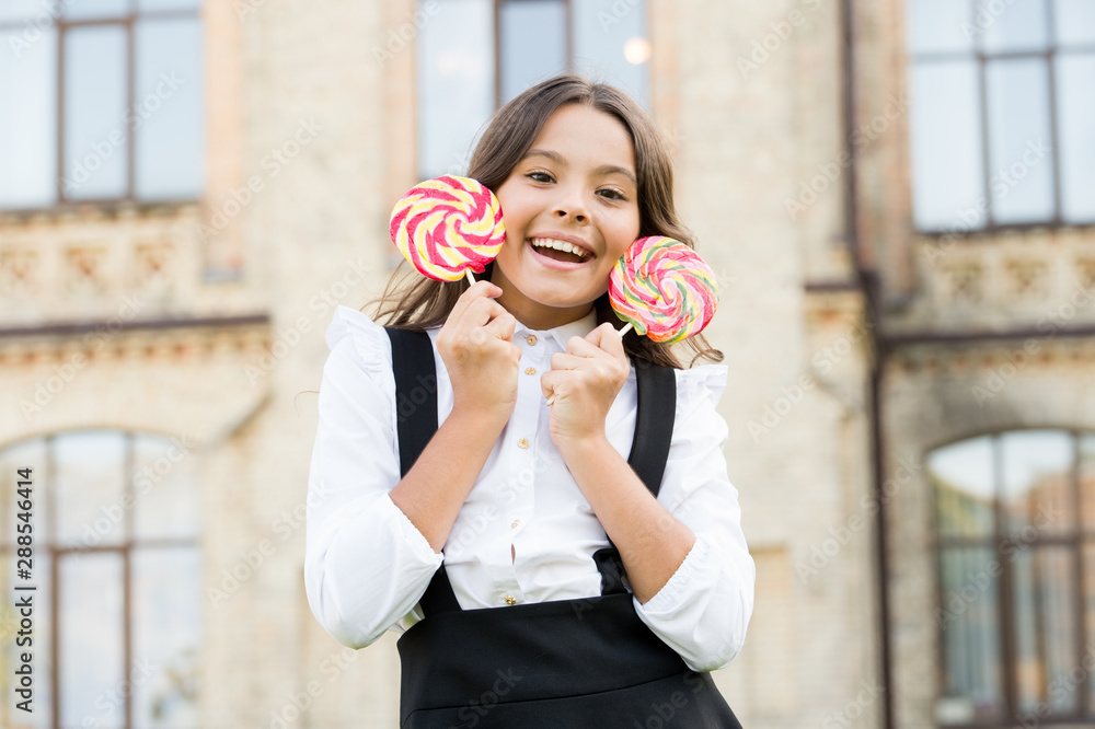 Crazy about sweets. Happy kid with candy. School nutrition. Calories ...